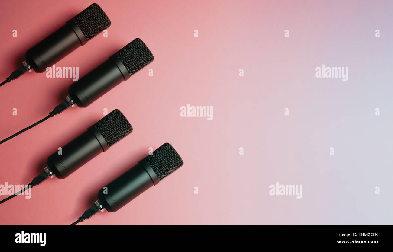 Mock up design of floating streaming mics microphones over a pink ...