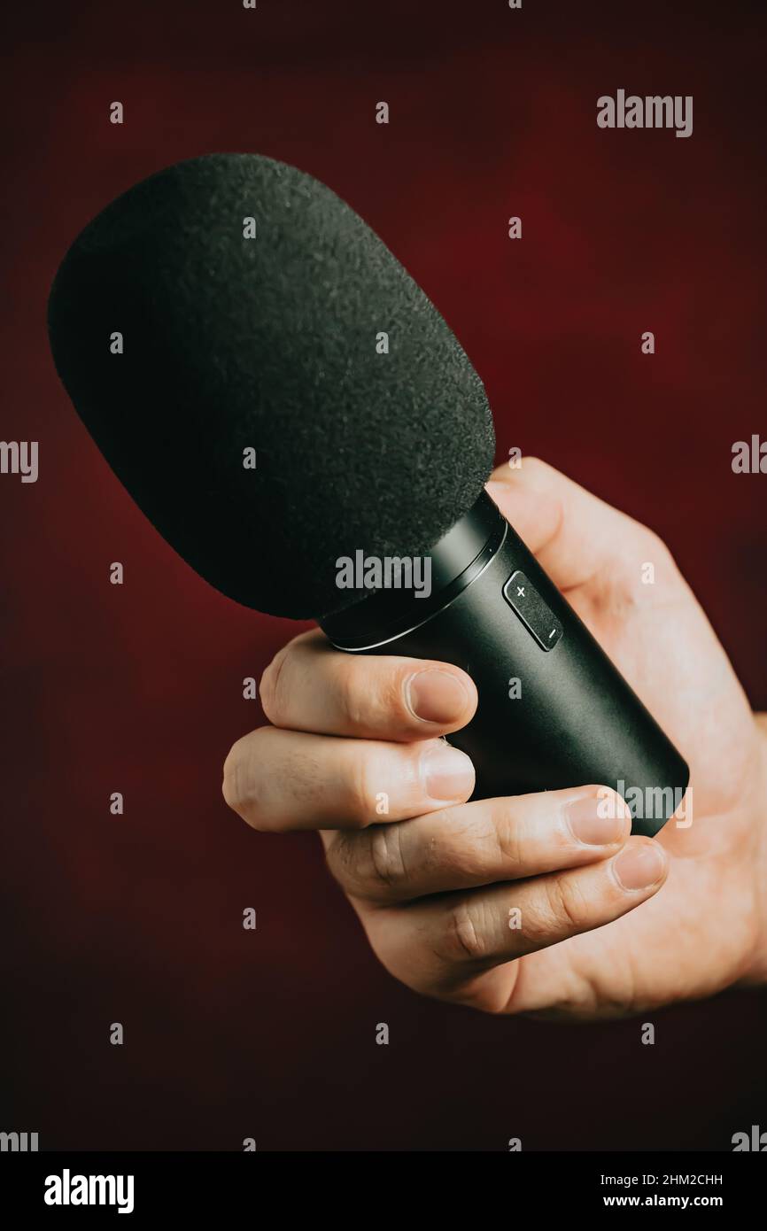 Announcer talking into microphone hi-res stock photography and images ...