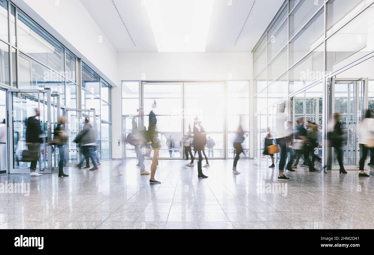 crowd blurred people at a trade fair hall Stock Photo - Alamy
