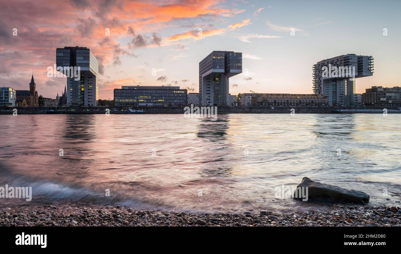 Skyline of Cologne, Germany with Crane Houses after sunset Stock Photo ...