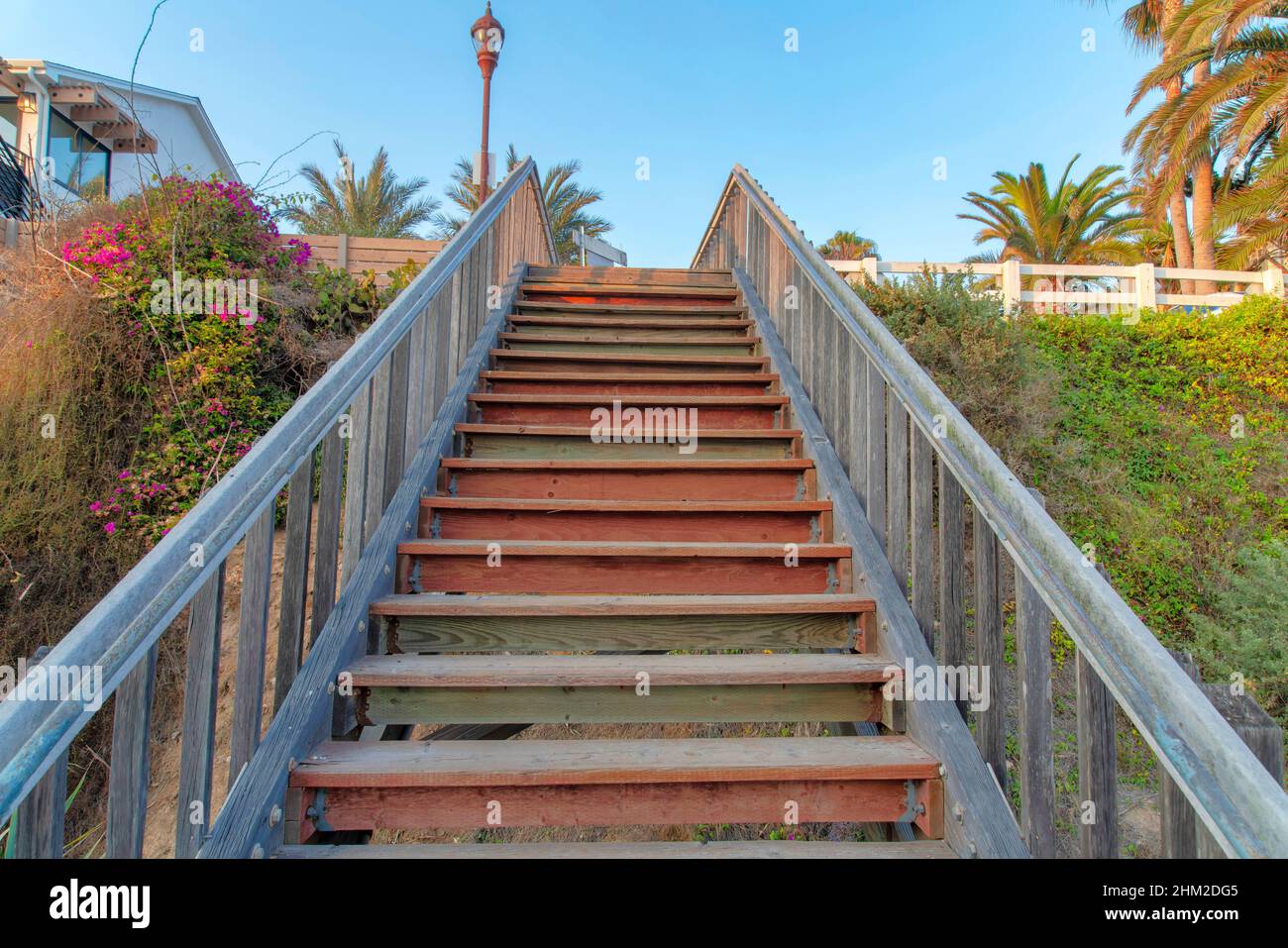 Straight upstairs with wooden steps and railings at Oceanside ...