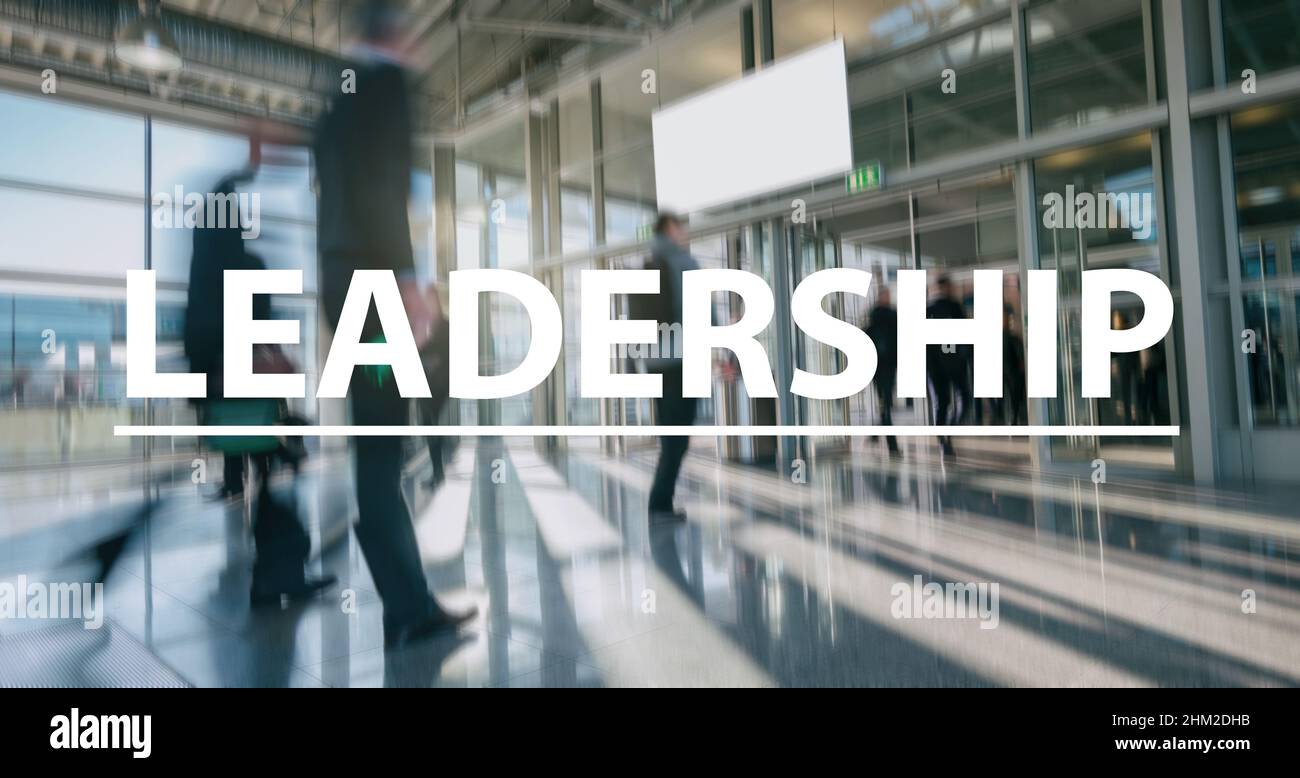 Leadership text Concept image - blurred Business people Stock Photo - Alamy