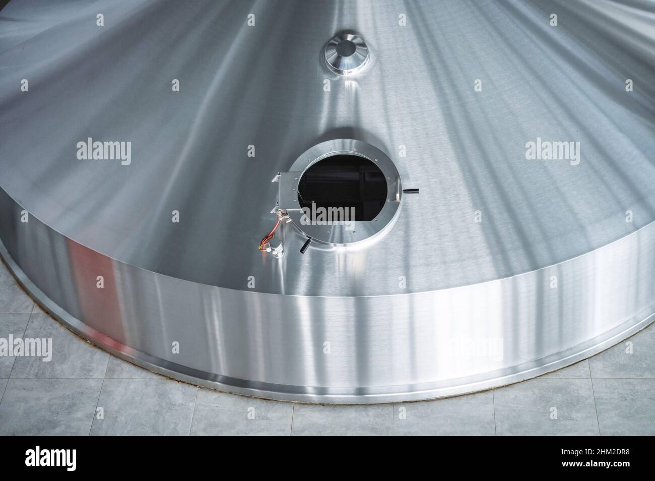 Mash vats of a brewery. Large metal fermentation tanks Stock Photo - Alamy