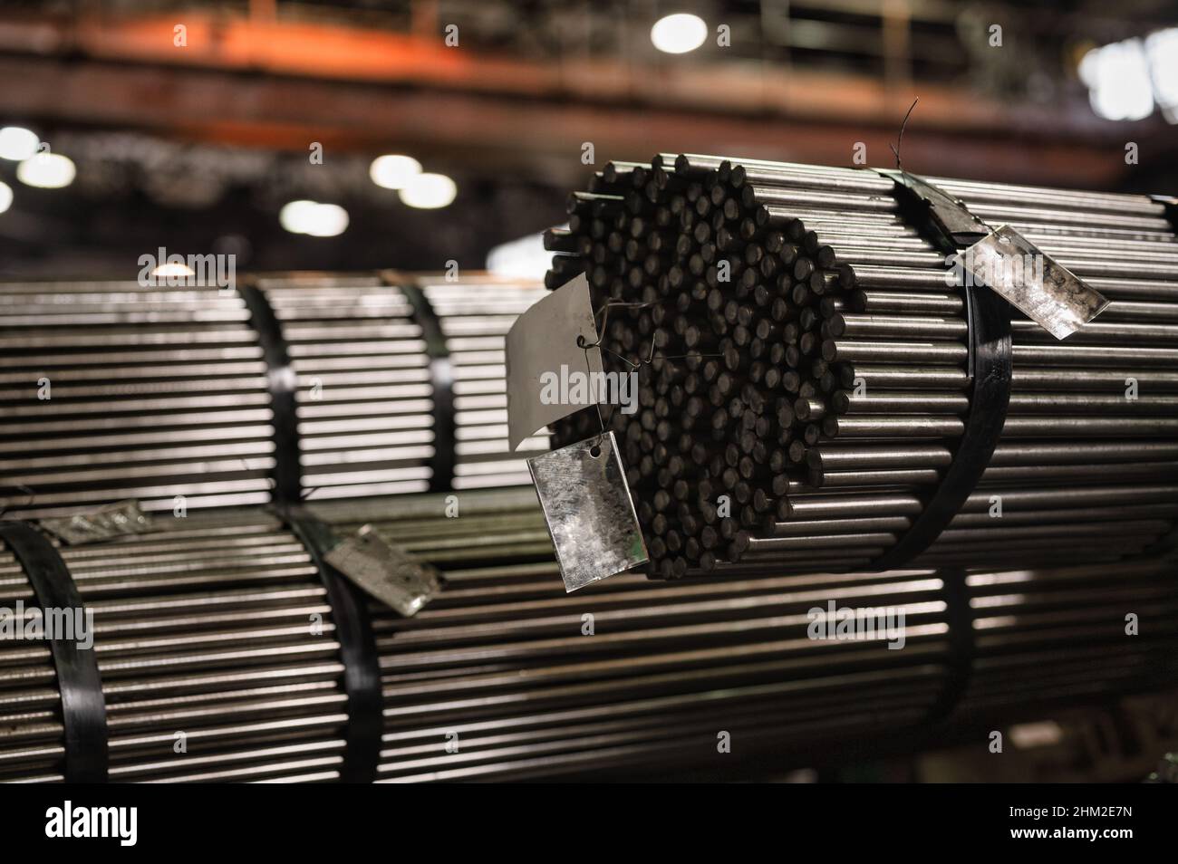 Hot rolled steel, bundle of round metal rods close-up Stock Photo - Alamy