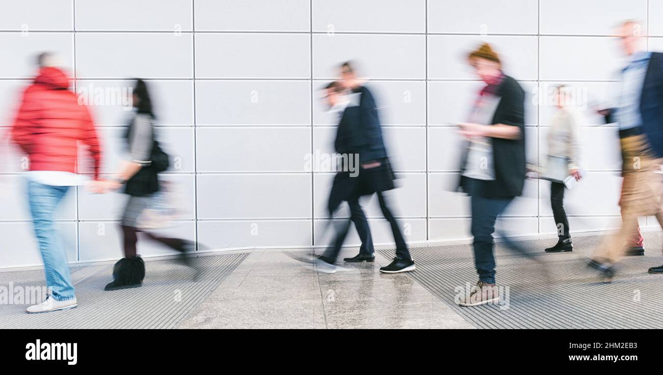 blurred people rushing in a modern floor Stock Photo - Alamy