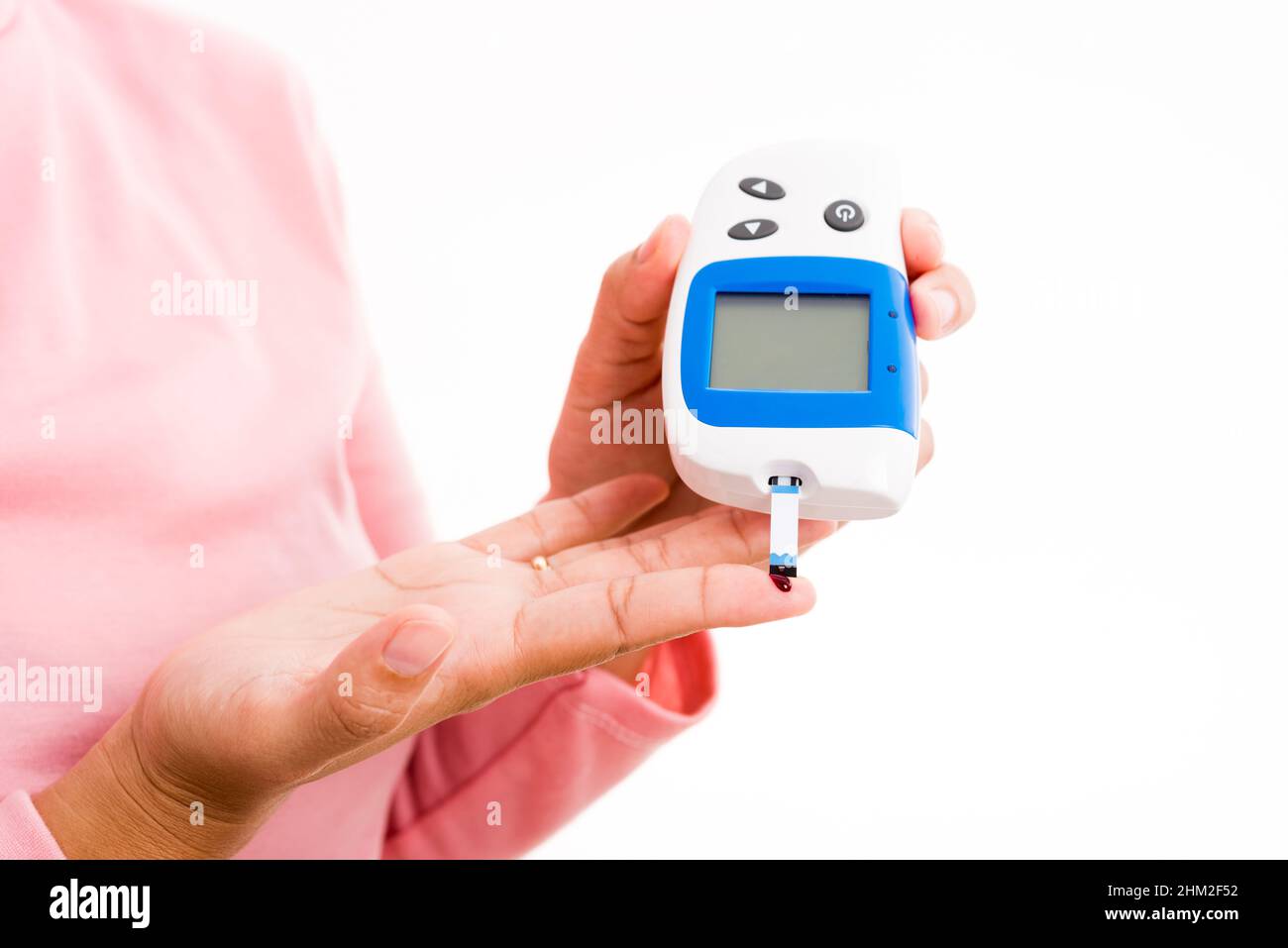 Closeup hands woman measur glucose test level check with blood on ...