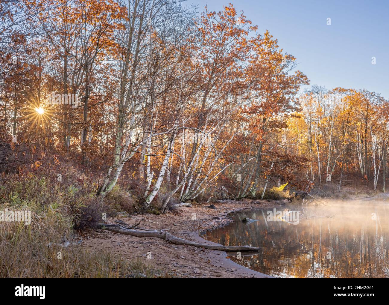 Sunrise along the shores of the Chippewa Flowage in northern Wisconsin ...