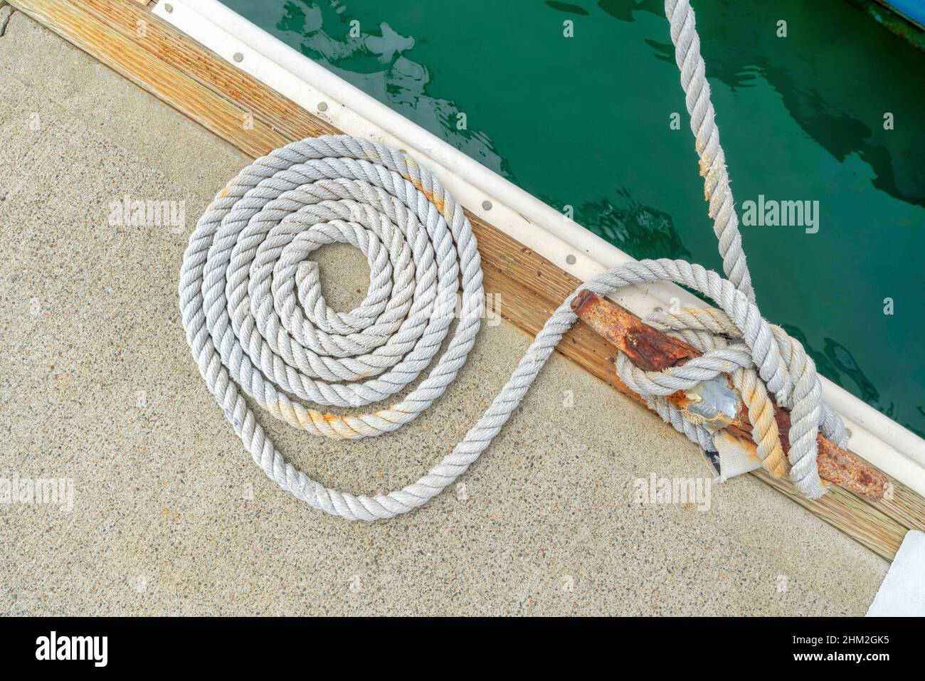 Spiral gray rope on a docking station at Oceanside, California Stock ...