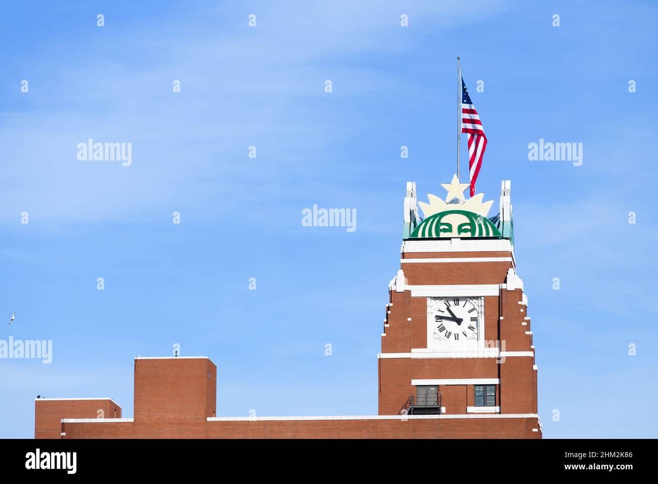 Seattle - February 06, 2022; Clock tower with logo on the Starbucks ...