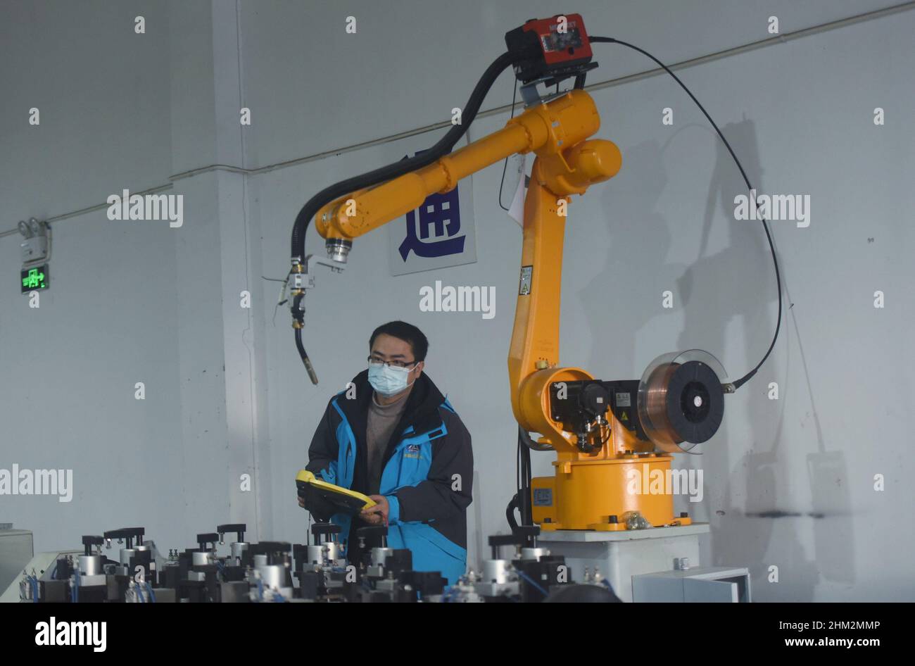 HANGZHOU, CHINA - FEBRUARY 7, 2022 - An engineer tests an industrial ...