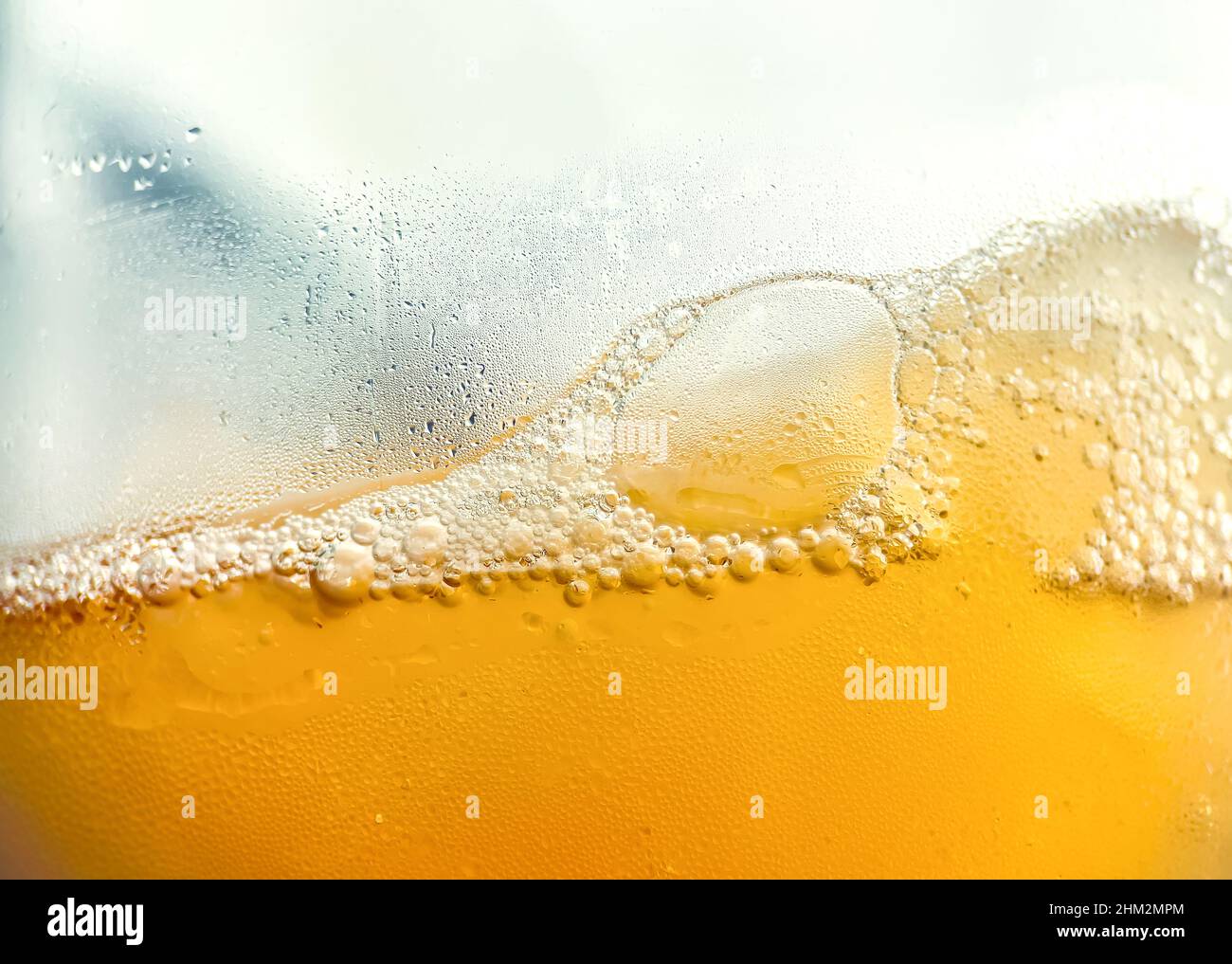 Glass with cold drink beer with condensation ice cool beverage ...
