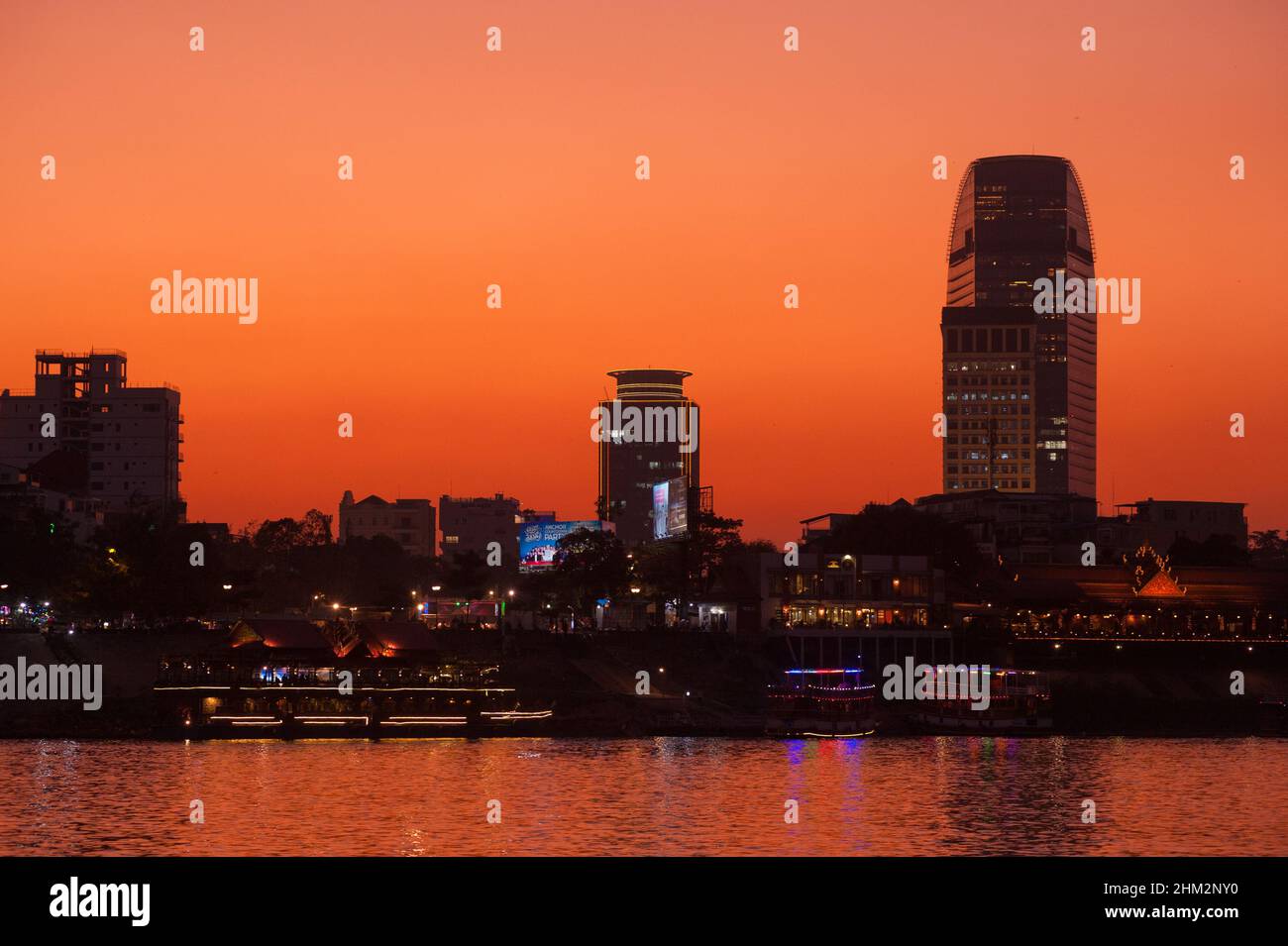 Sunset over the Phnom Penh skyline & The Tonle Sap River. Phnom Penh ...