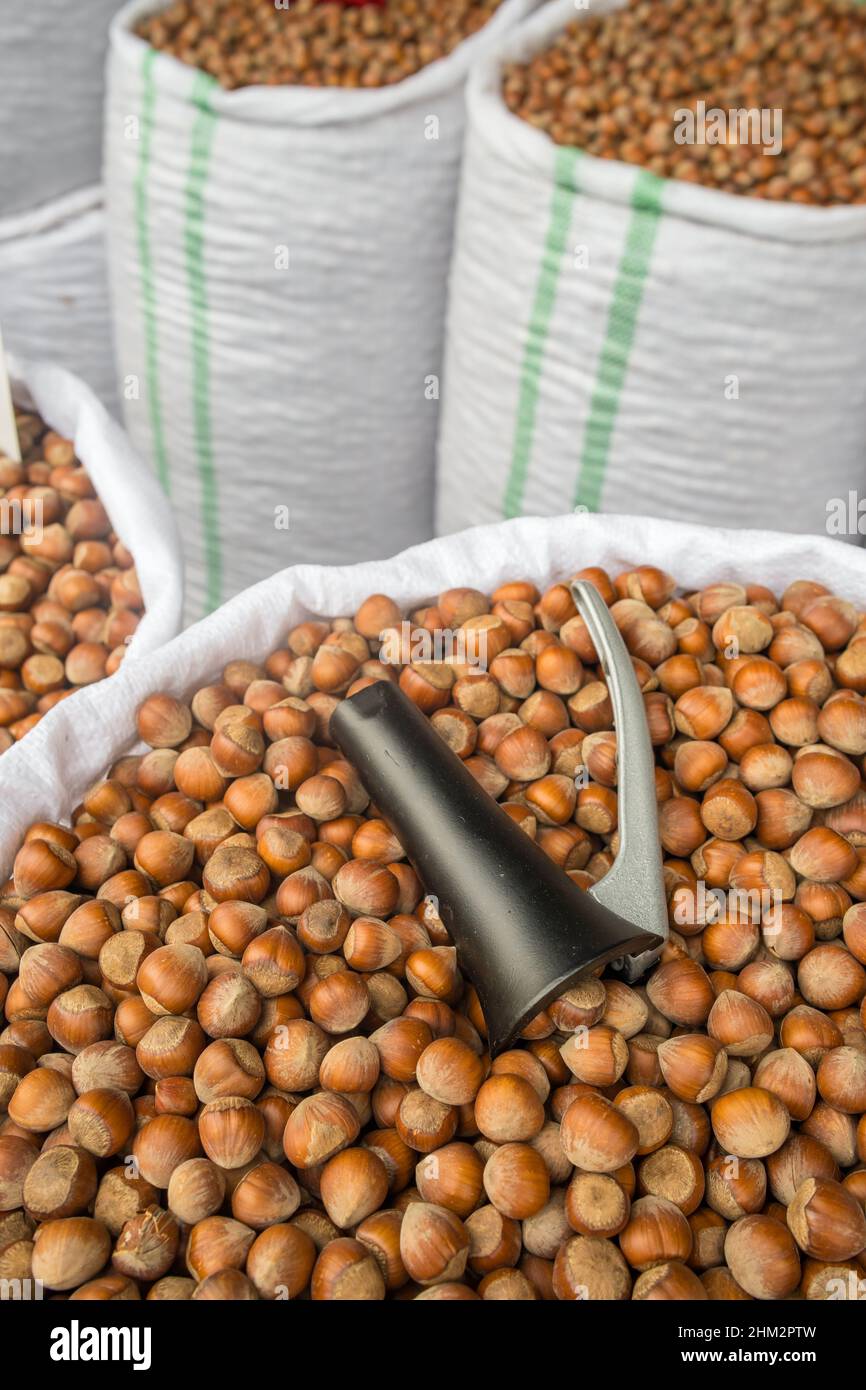 Fresh hazelnuts in shells for sale in outdoor food market Stock Photo ...