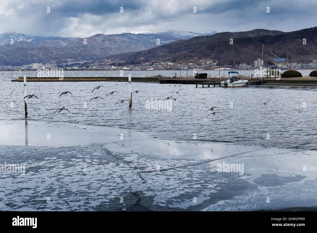 suwa, nagano, japan, 2022/06/02 , View of the frozen Lake Suwa (Suwa-ko ...