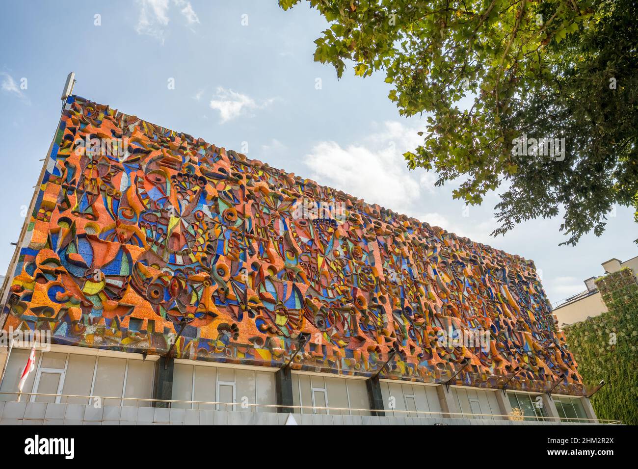 Colourful mosaic facade of Auditorium of the industrial technical ...