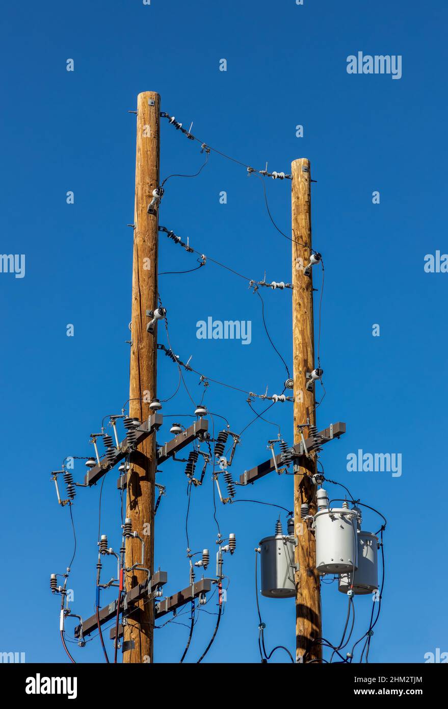 Line wooden poles hi-res stock photography and images - Alamy