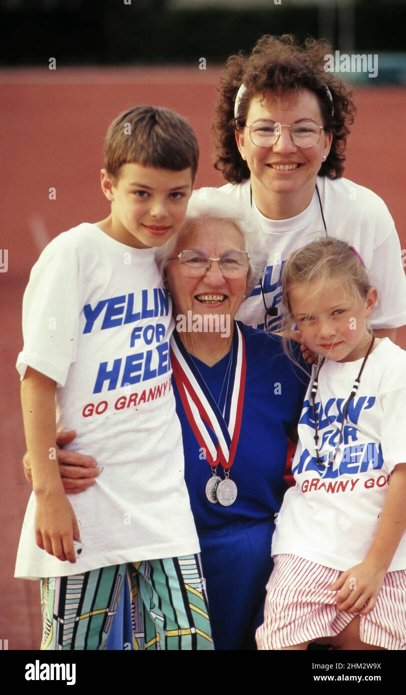 Senior olympics medal winner with family hi-res stock photography and ...