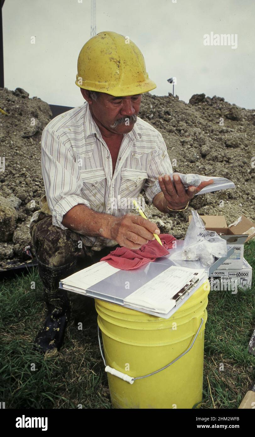 Taylor, Texas USA 1992: Hispanic soil engineer checks for ground ...