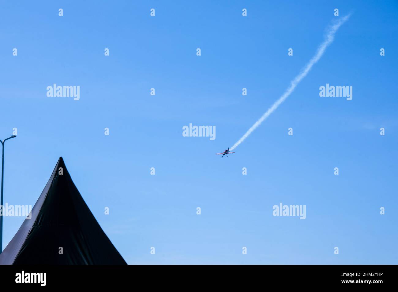 Overhead flying aircraft. Aircraft in formation during an aerobatics ...