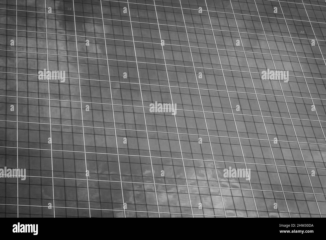 Glass windows of modern office building background Stock Photo - Alamy