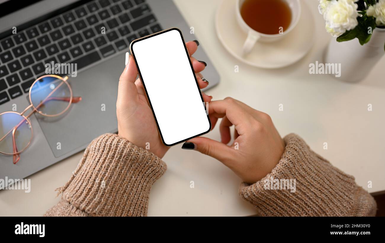 Minimal cozy female office desk with female in cozy brown sweater ...
