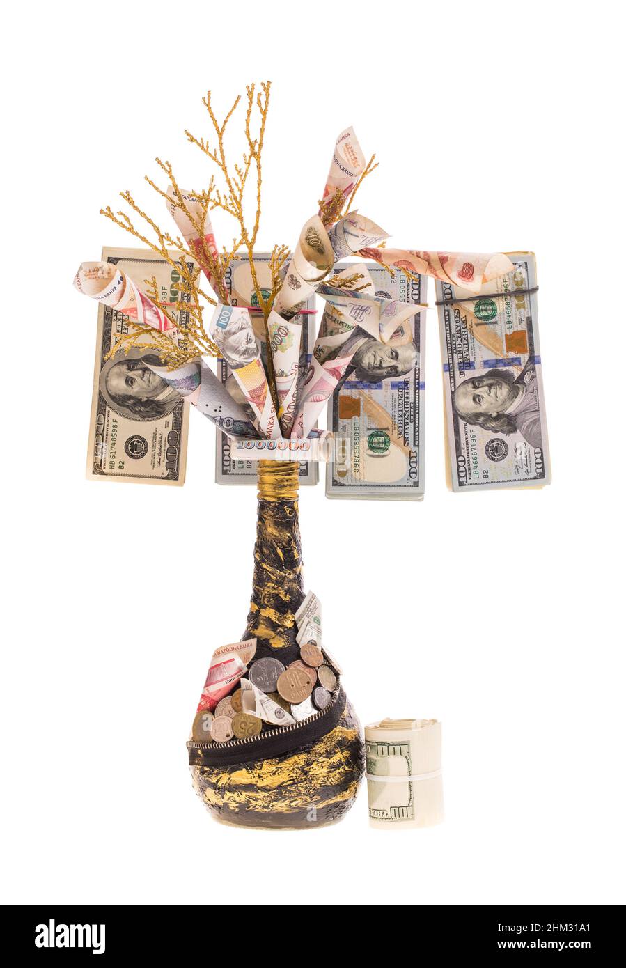 Currency bills on a handmade money tree isolated on white background ...