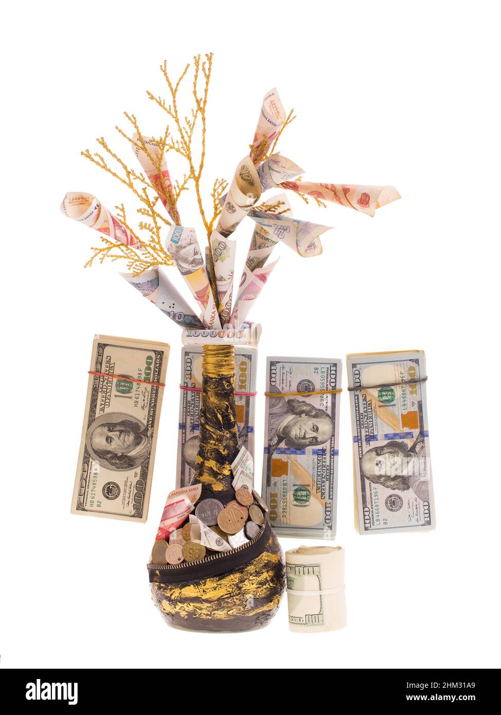Currency bills on a handmade money tree isolated on white background ...