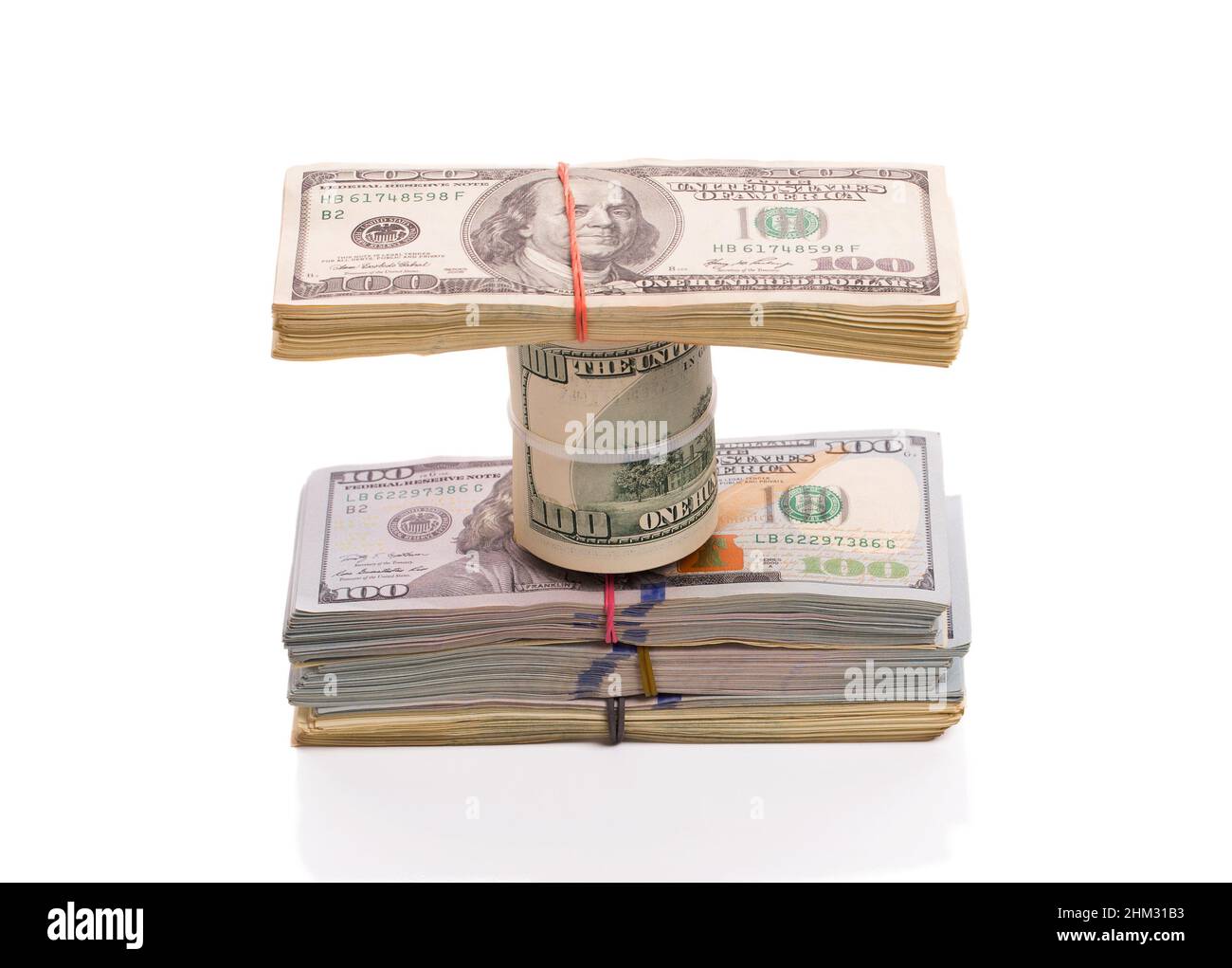 Dollar bills in stacks and rolls isolated on white background Stock ...