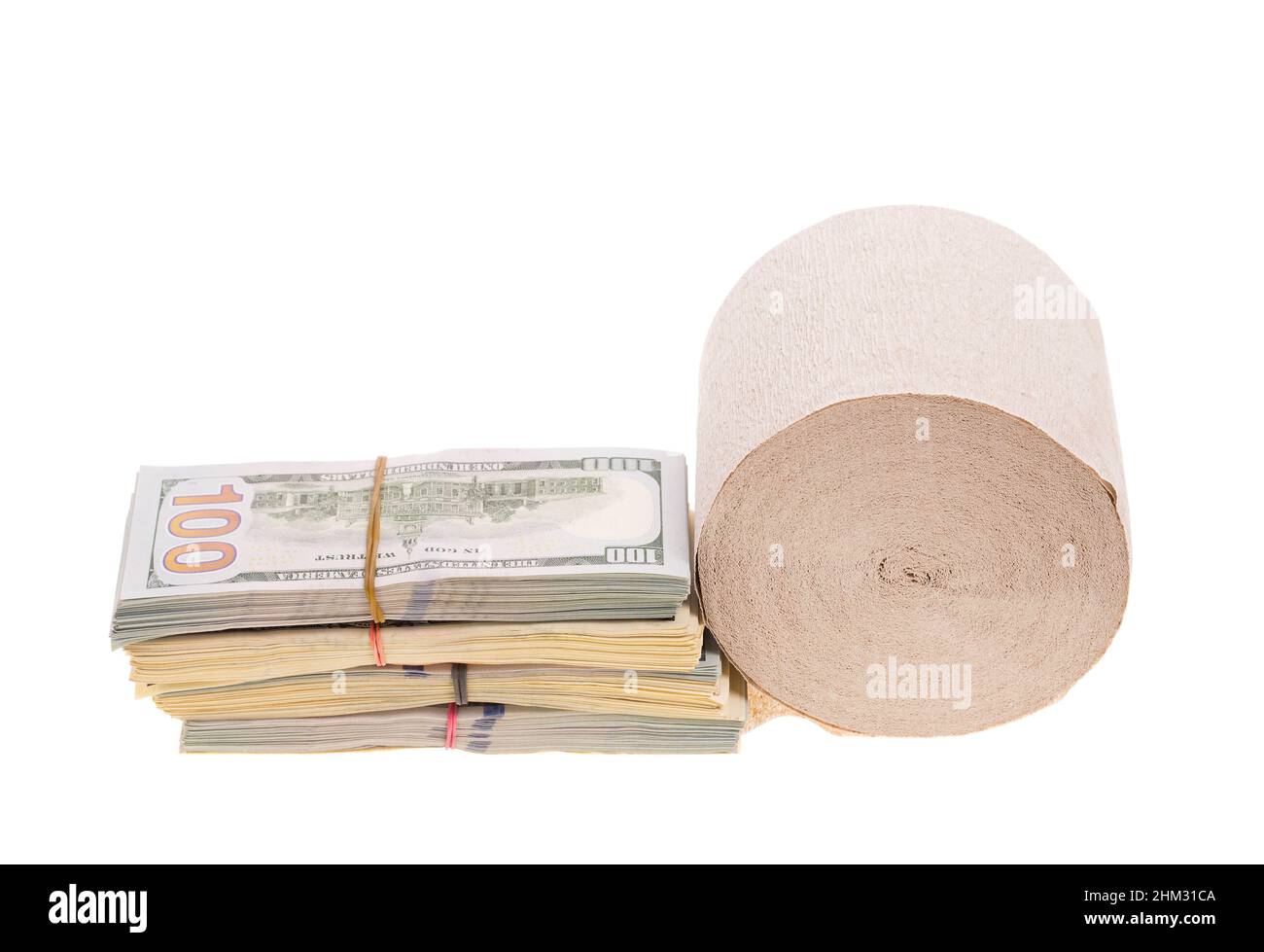 Dollar bills in stacks and toilet paper isolated on white background ...