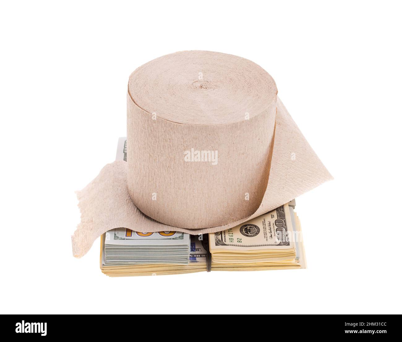 Dollar bills in stacks and toilet paper isolated on white background ...