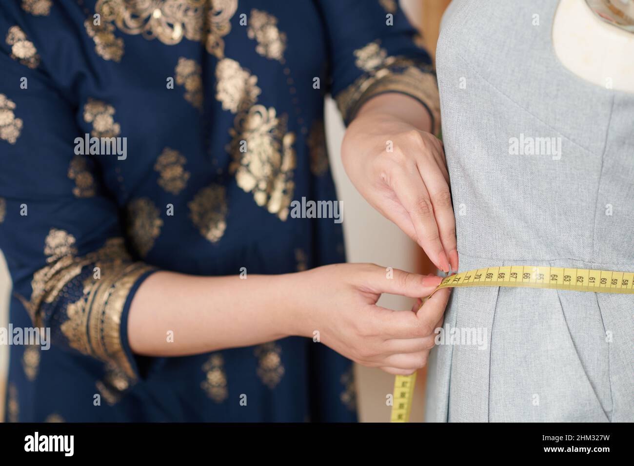 Indian woman measuring waist hi-res stock photography and images - Alamy