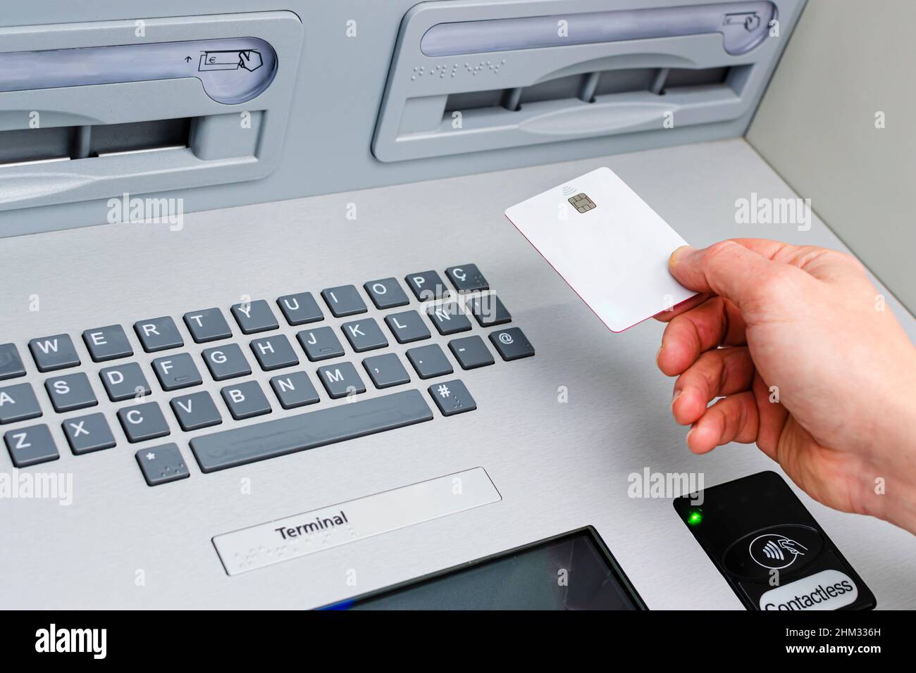 Person using a atm hi-res stock photography and images - Alamy