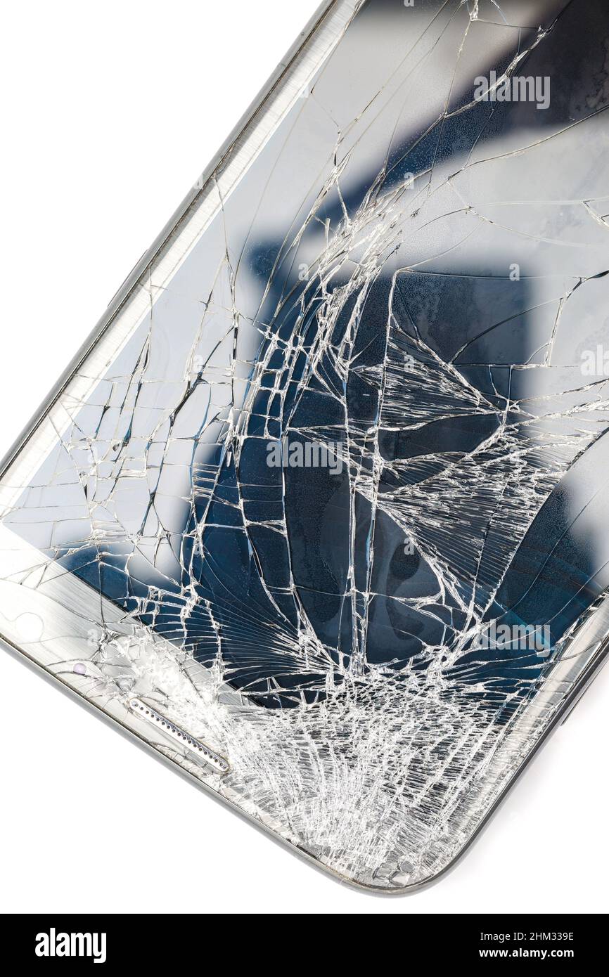 Close up of broken screen smart phone isolated on white background ...