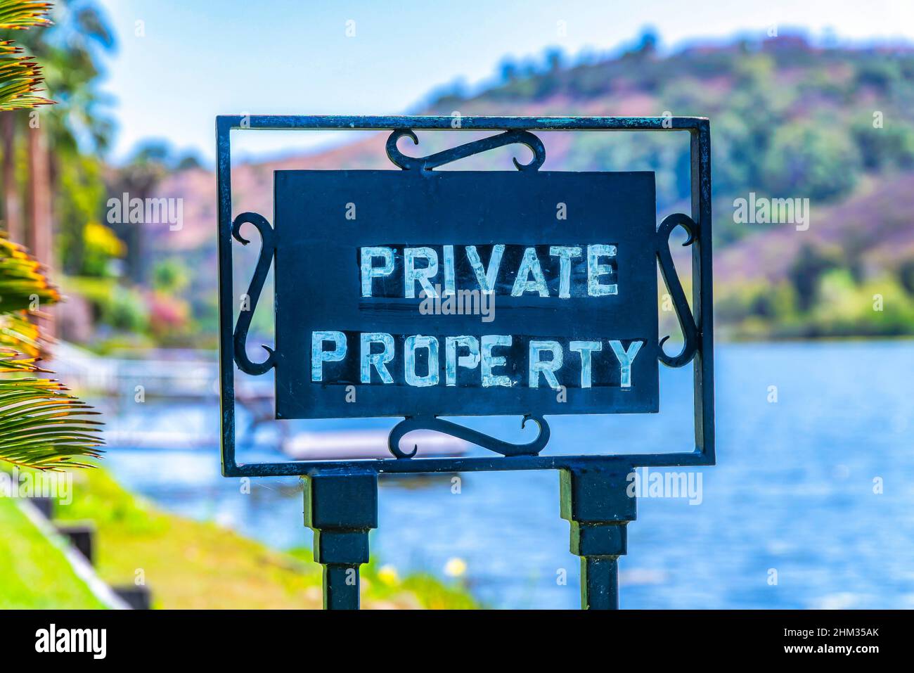 Private property sign on a wrought iron signage at Lake San Marcos in ...