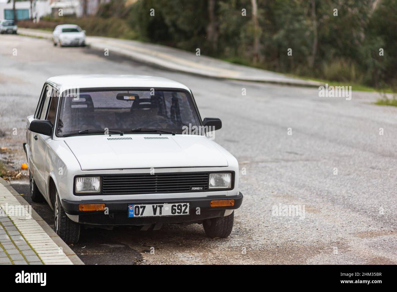 Side, Turkey -January 25, 2022: white Tofas is parked on the street on ...