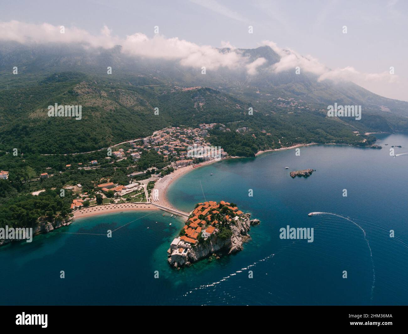Aerial view of Sveti Stefan island in the background of the bay Stock ...