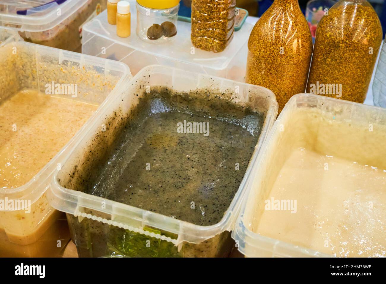 Three samples of the variety of honey available, including a black ...