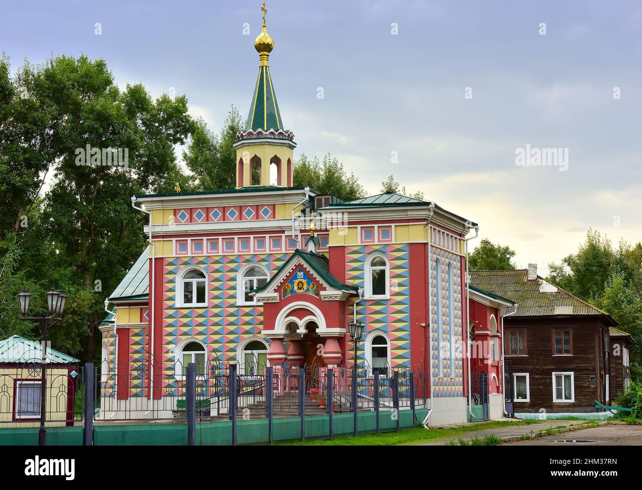 Bright architecturally decorated facade in the Russian traditional style. Abakan, Siberia ...