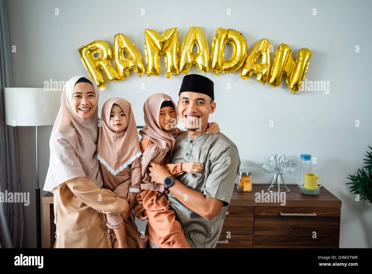 beautiful muslim family portrait together smiling to camera Stock Photo ...