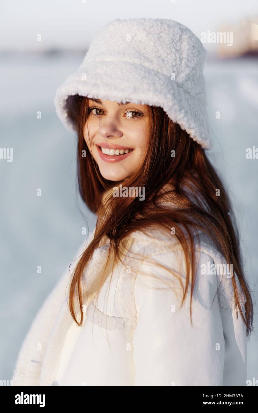 young woman red hair snow field winter clothes nature Stock Photo - Alamy