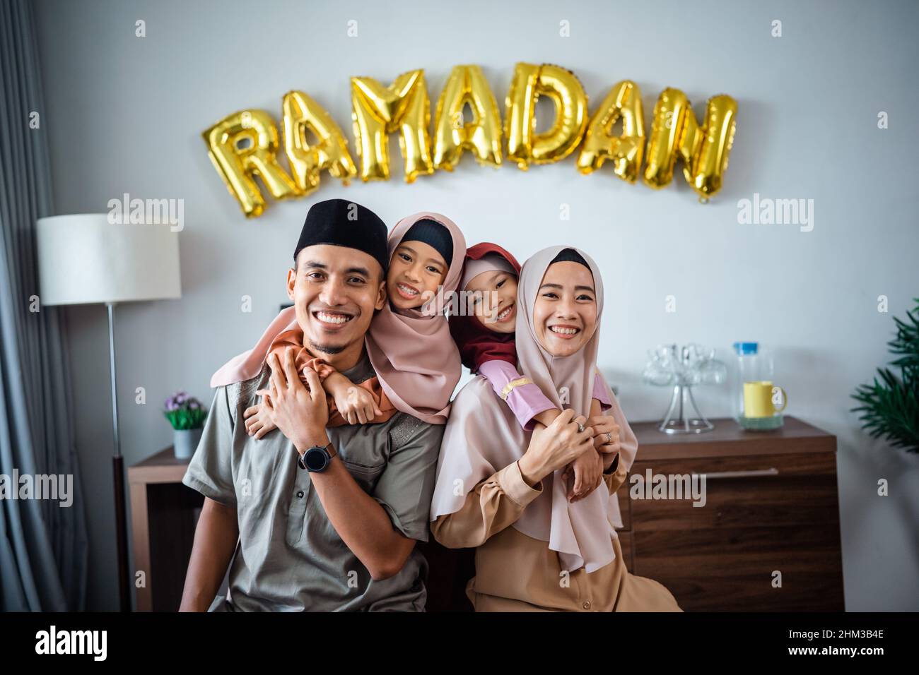 beautiful muslim family portrait together smiling to camera Stock Photo ...