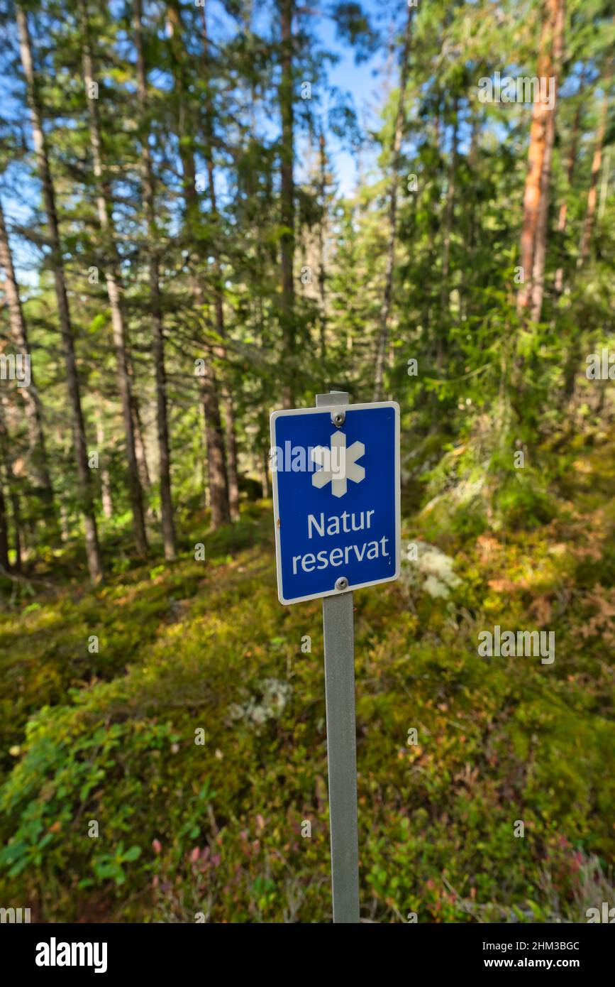 Nature reserve sign in front of forest in sweden Stock Photo - Alamy