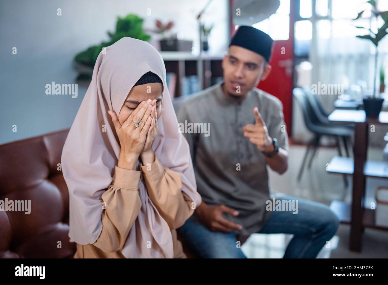 muslim Angry man is yelling at his wife Stock Photo - Alamy
