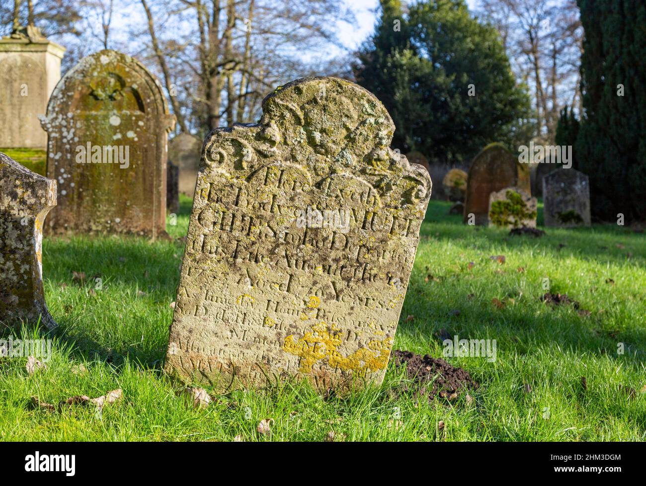 Weathered 18th century grave stone headstone in churchyard, Syleham ...