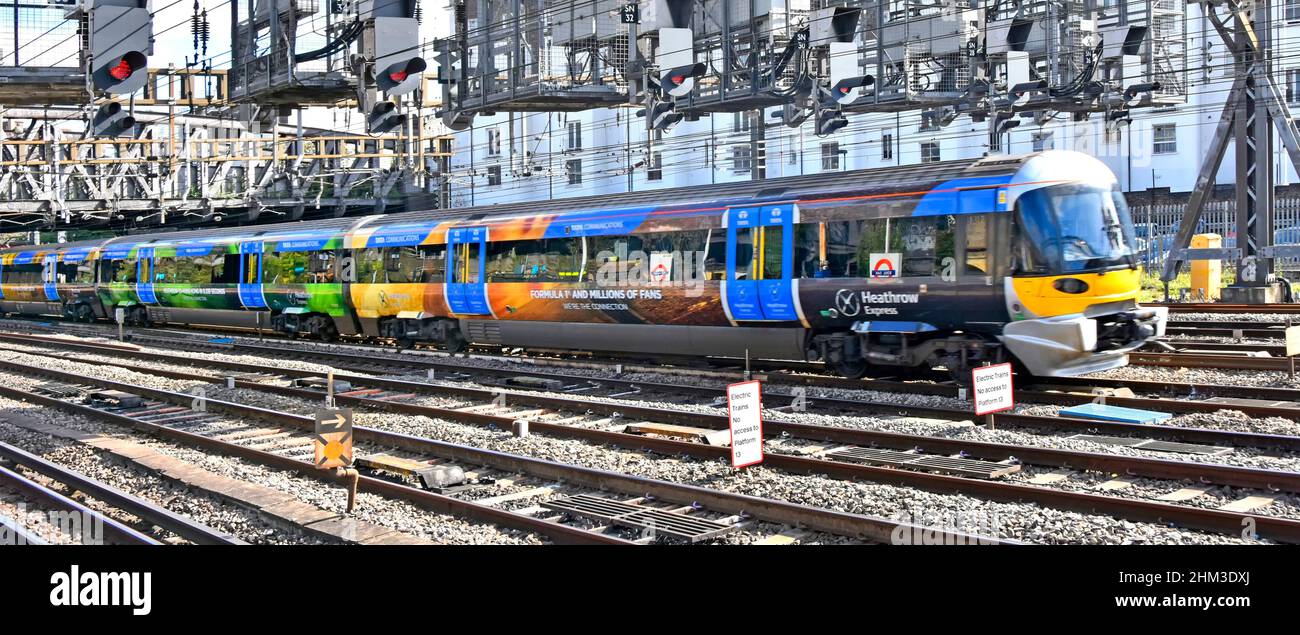 Heathrow Express train colourful mobile advertising on carriages ...