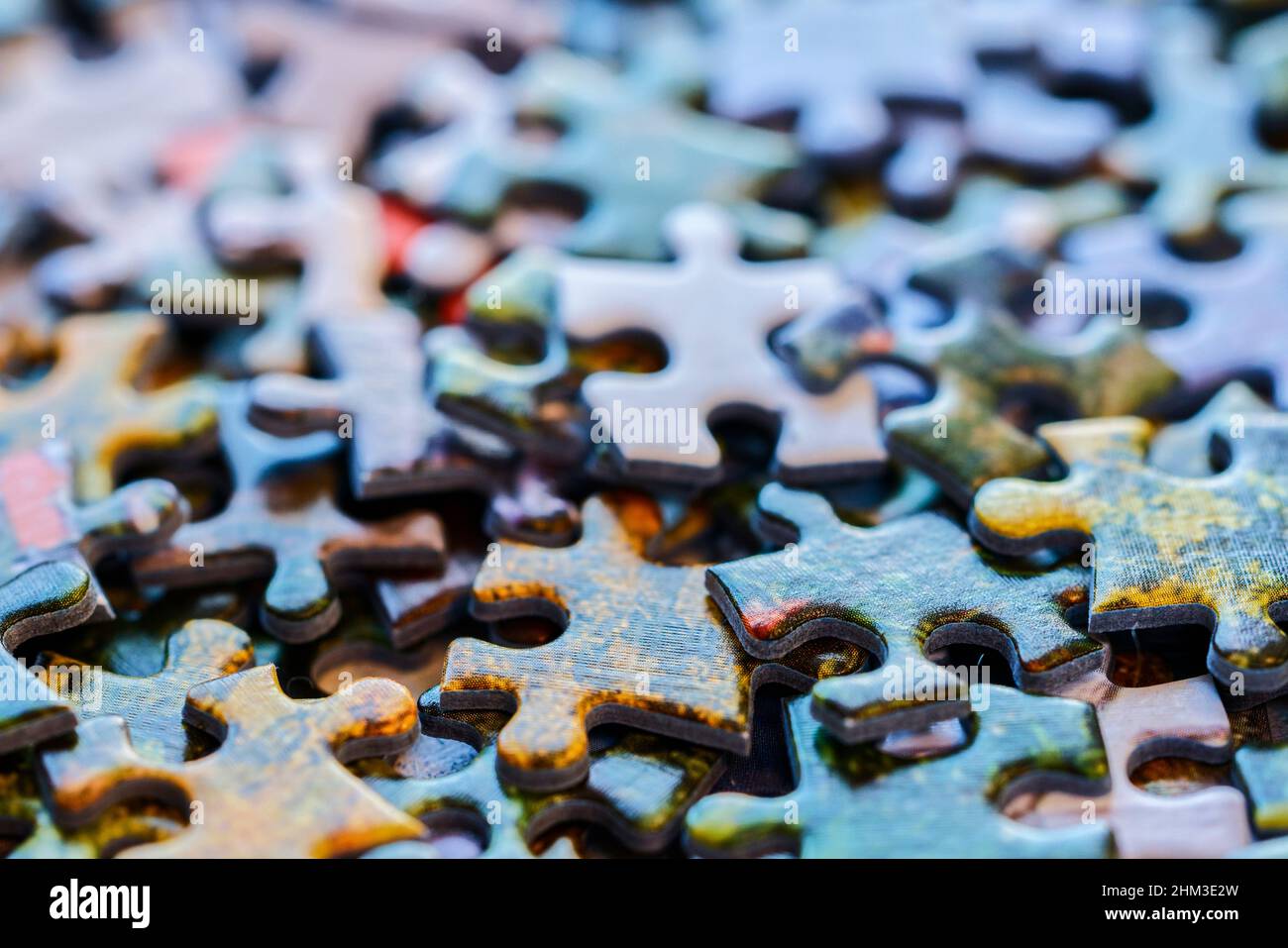 close up with puzzle pieces in blur background Stock Photo - Alamy