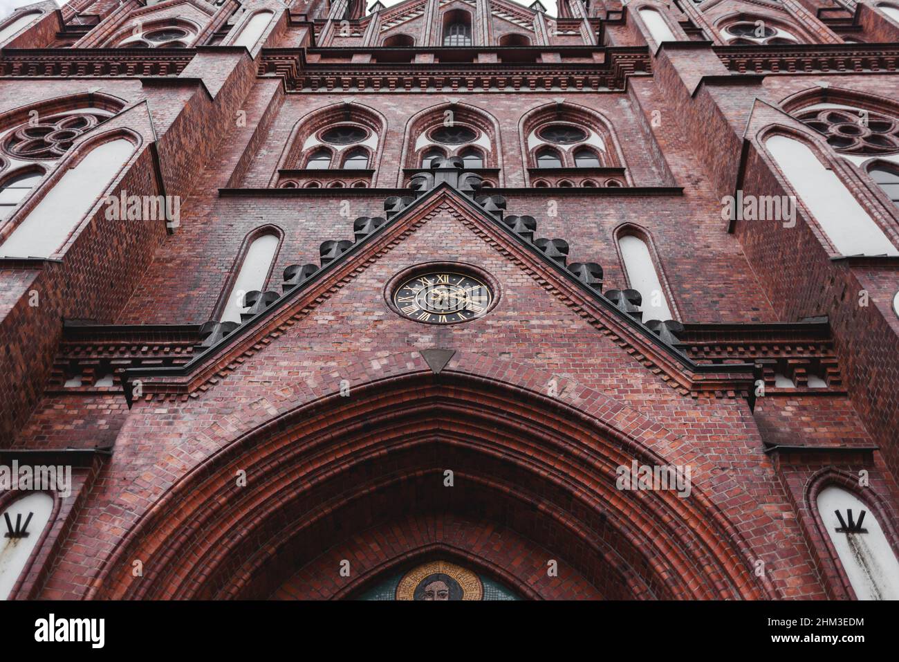 Antique red brick church in Europe city. Catholicism. Gothic ...
