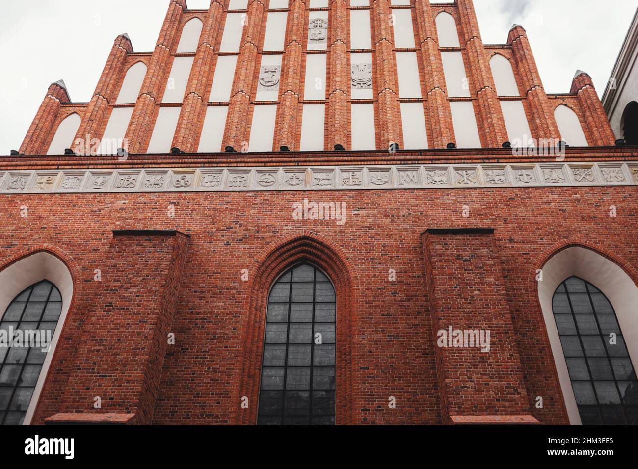 Gothic architecture. Historical brick building Stock Photo - Alamy
