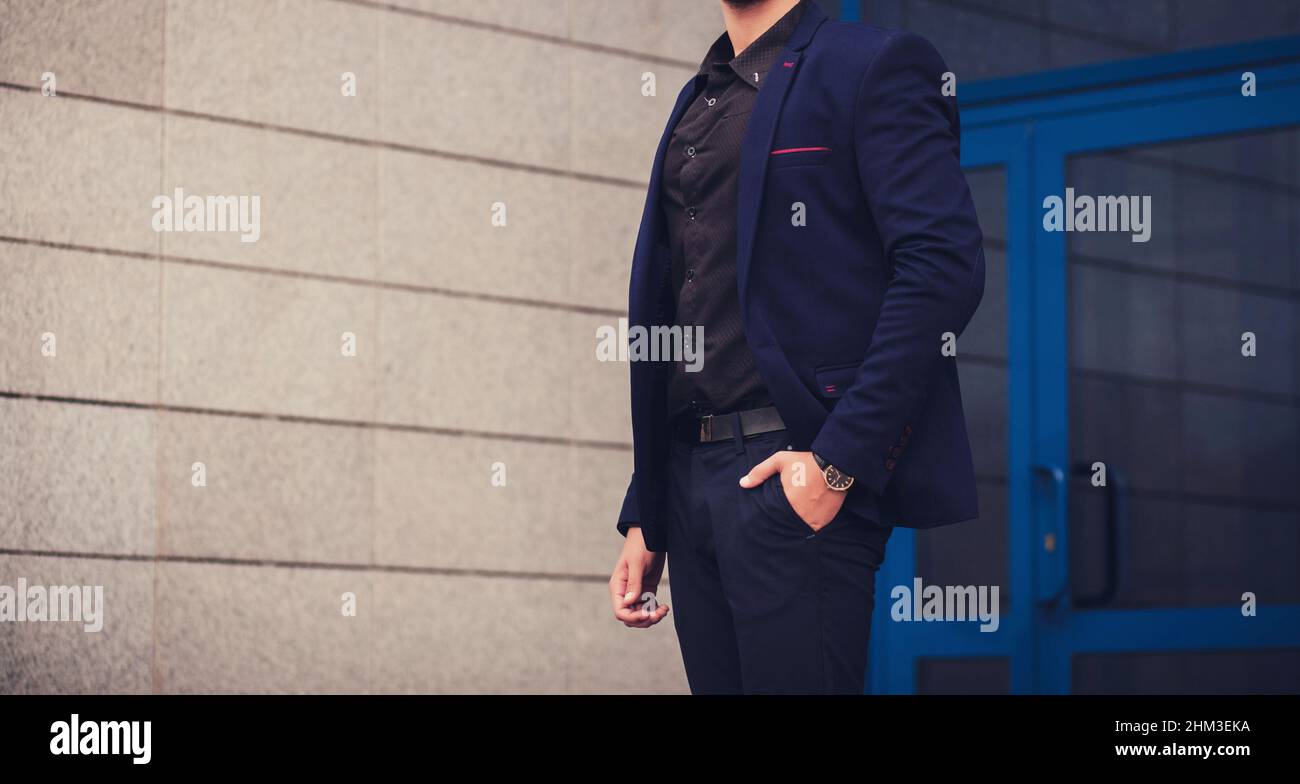 elegant businessman near the office. male manager Stock Photo - Alamy
