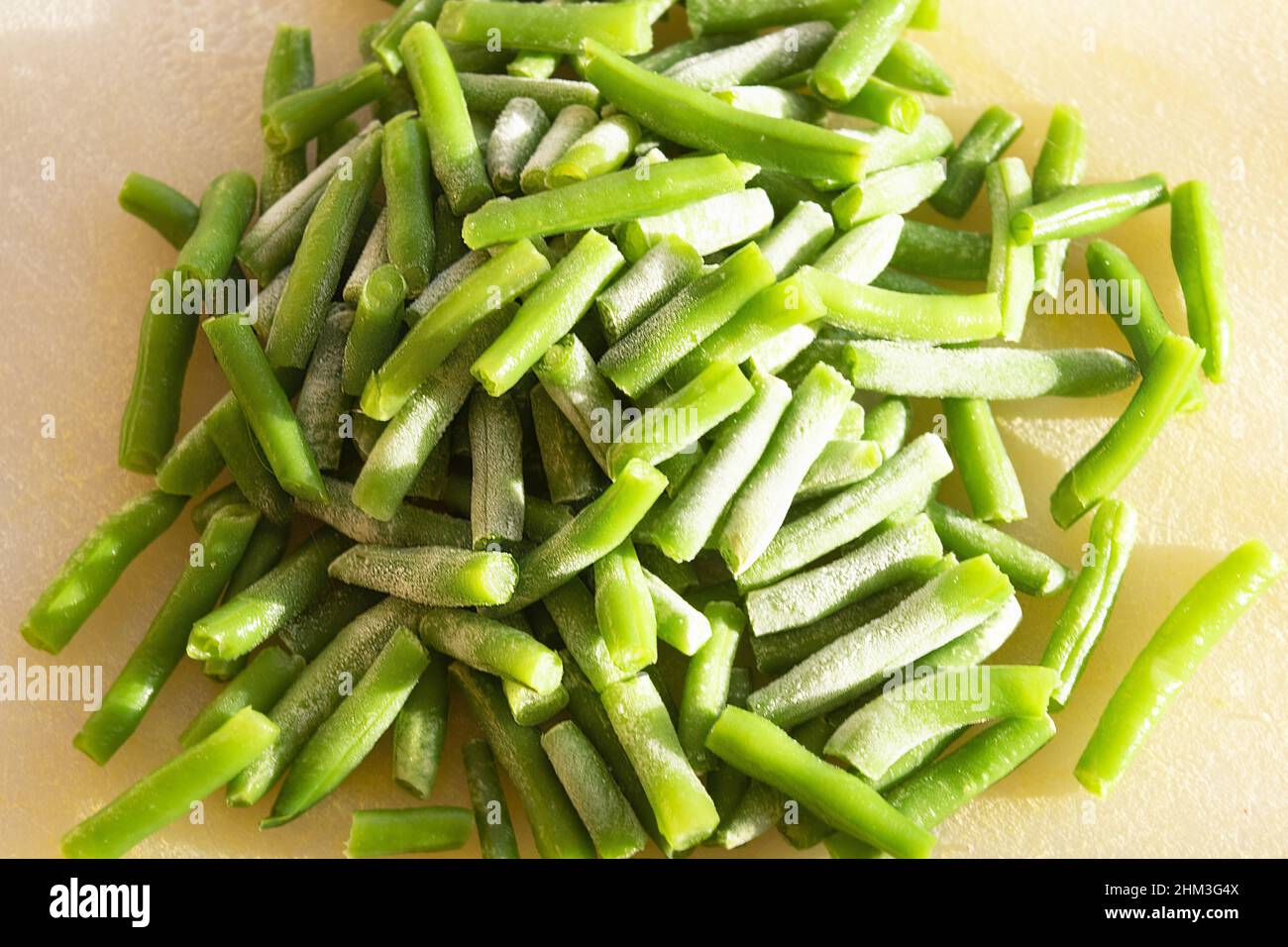 frozen green beans cut in little pieces Stock Photo - Alamy